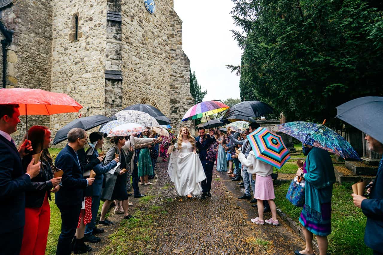 Rain on your wedding day embrace it, plan for it and enjoy it!